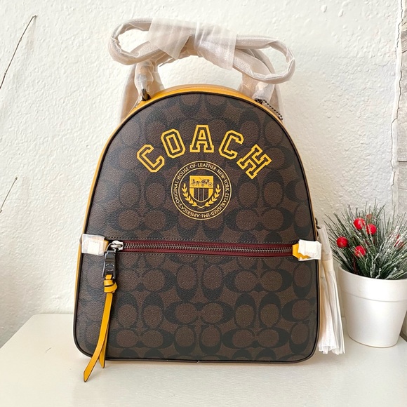 Coach | Bags | Coach Jordyn Backpack In Signature Canvas With Varsity ...